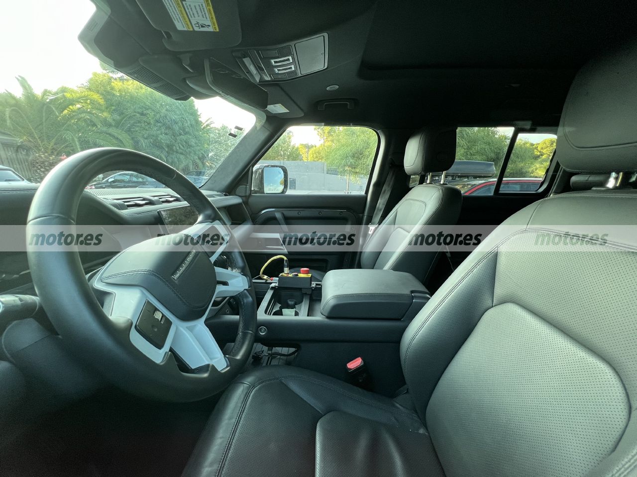 The interior of the new Land Rover Defender 130 model is exposed, with ...