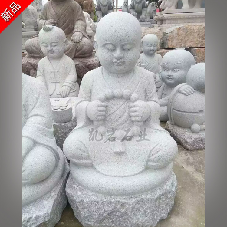 Stone carving little novice monk - iNEWS