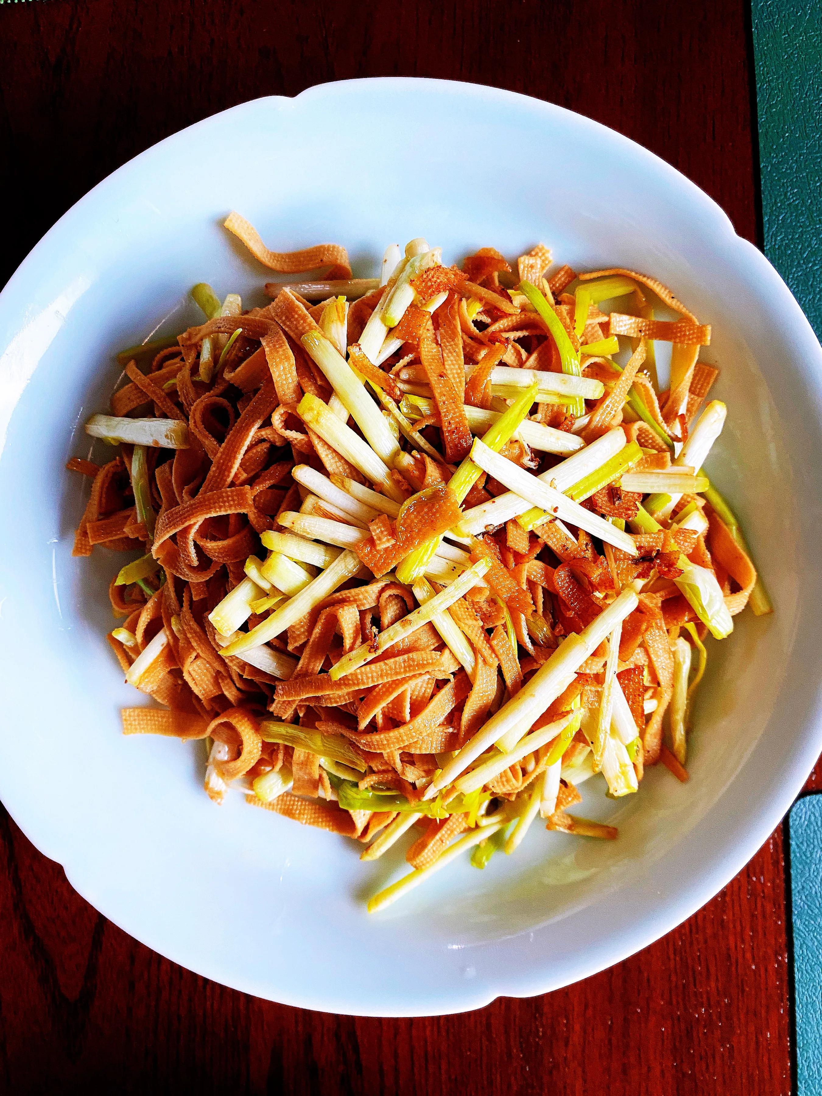 Fried garlic sprouts with dried tofu for dinner yesterday - iNEWS