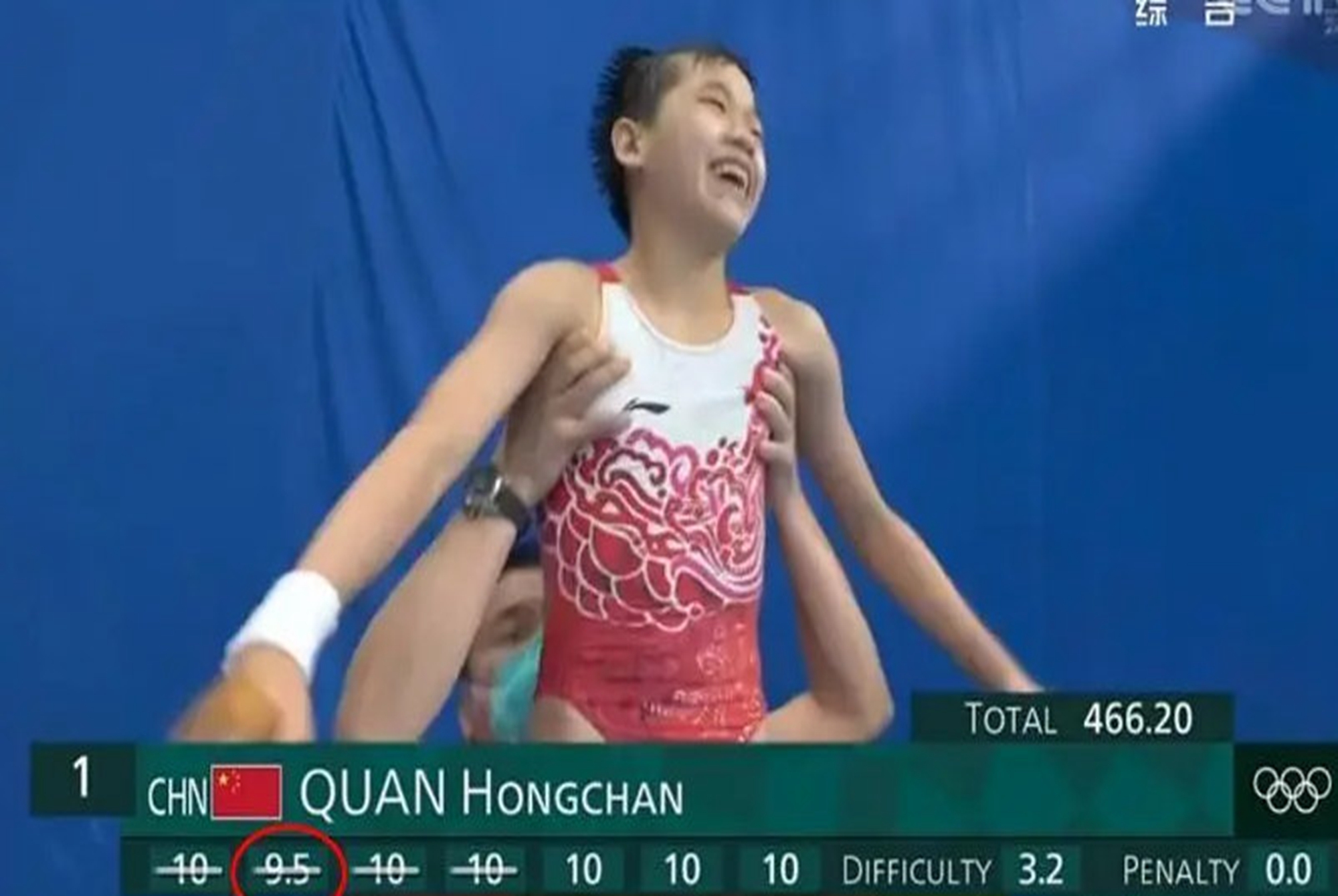 The 14-year-old Quan Hongchan won gold in the 10-meter platform diving ...