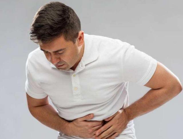 A man puts a few drops of Fengyou Essence on his belly every night ...