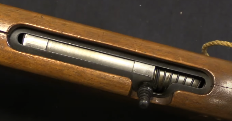 A close relative of the Stern submachine gun, the British one-handed ...