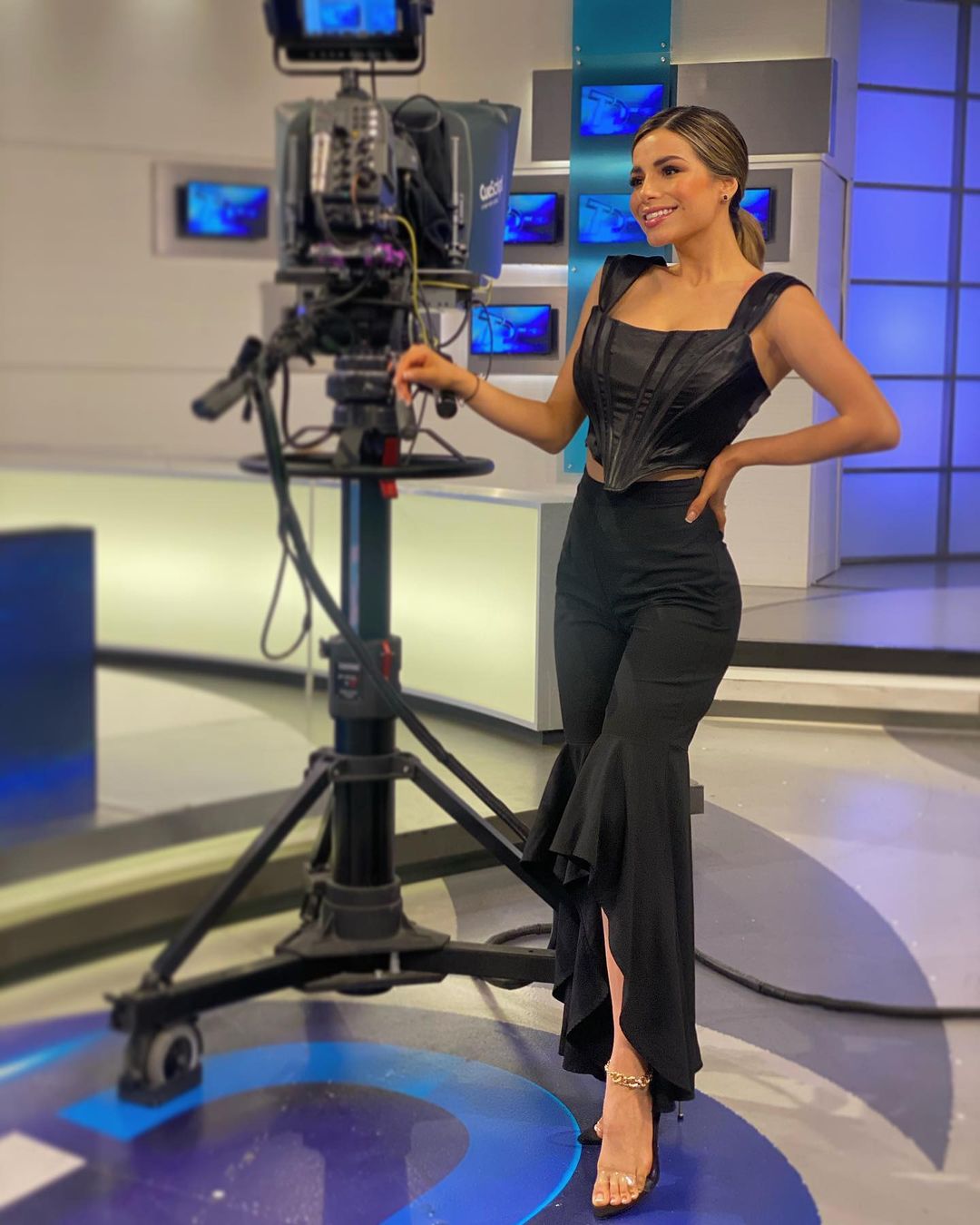 She is a Mexican radio host, with a sweet face, and a charming dimple ...