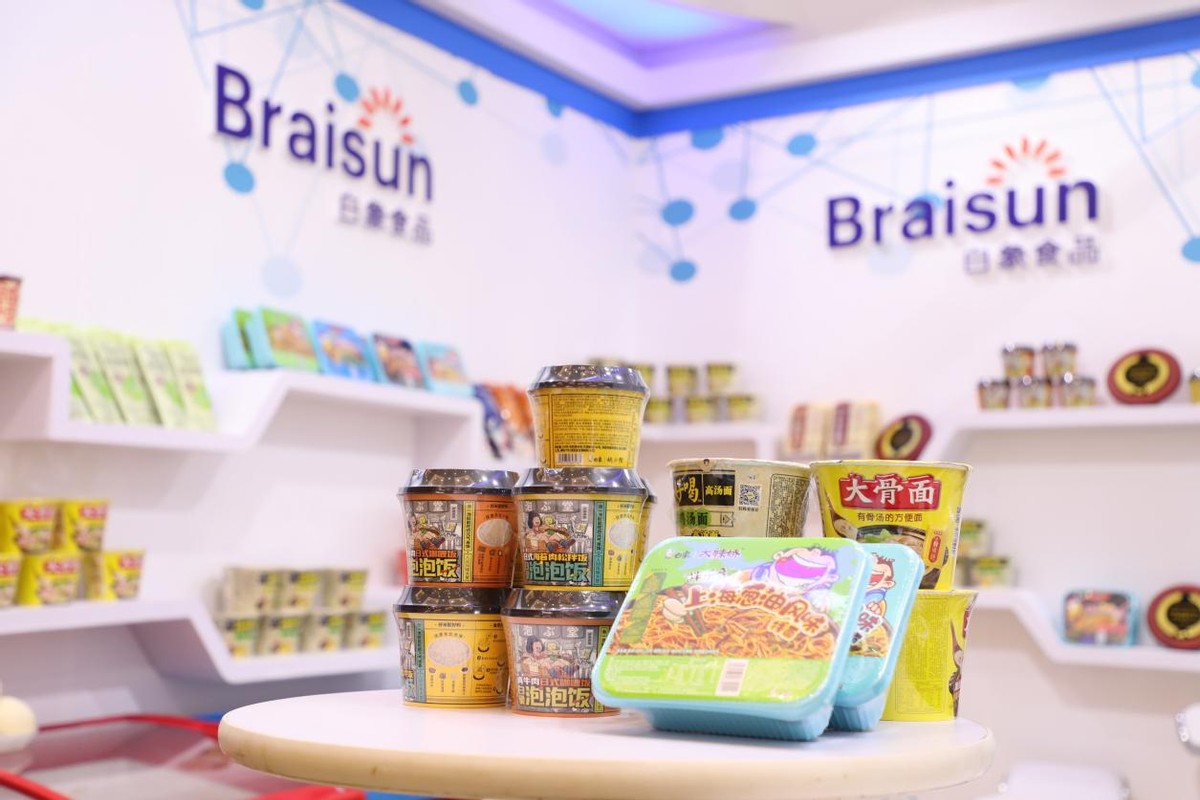 The new logo of Baixiang Foods exposes delicious fast food products or ...