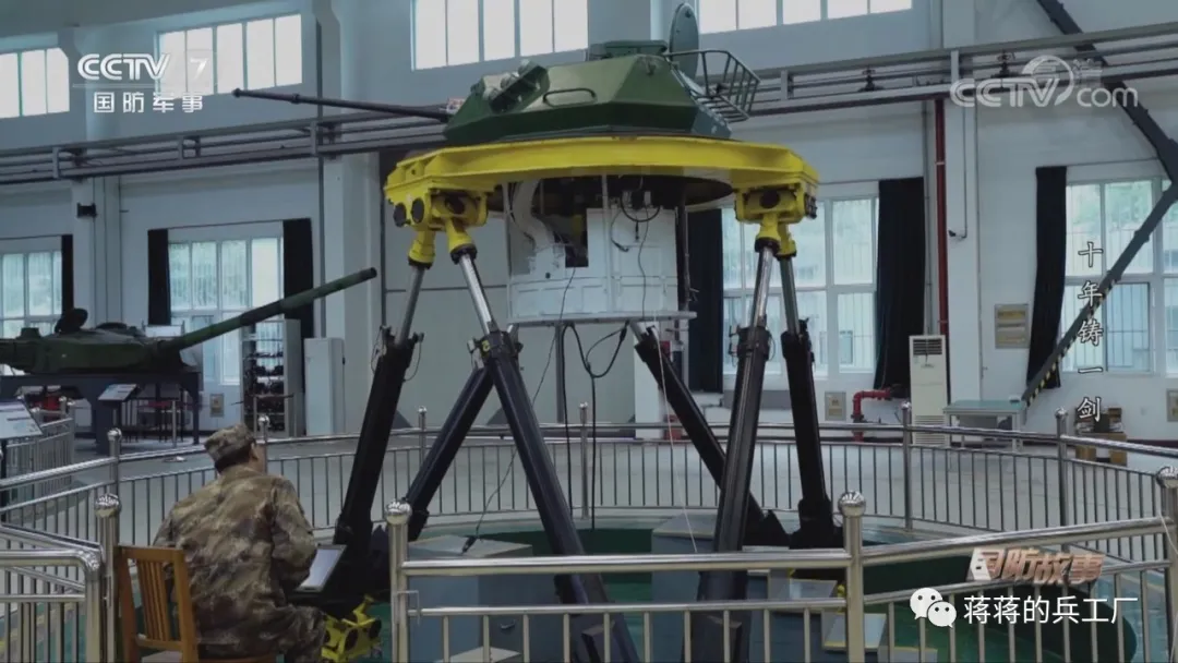 A six-degree-of-freedom swing test bed is installed on the tank turret ...