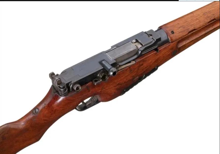 A rare Japanese pre-war semi-automatic rifle, Ogura trial-produced a ...