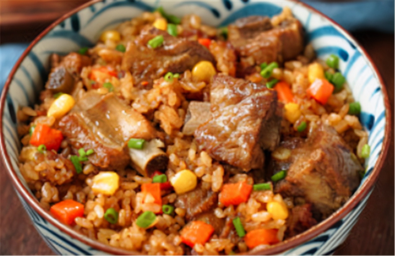 Teach you how to make braised rice with ribs at home, it is simply the ...