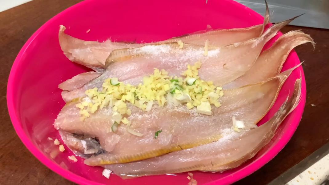 When frying fish, some people use starch and some people use flour?It's ...