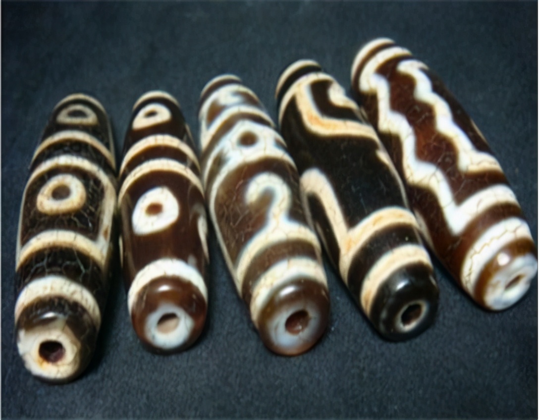 There are only two nine-eyed dzi beads left in the world. Jet Li spent ...