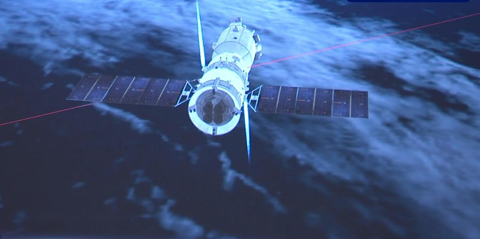 The white return capsule was burnt to charcoal black by the atmosphere ...