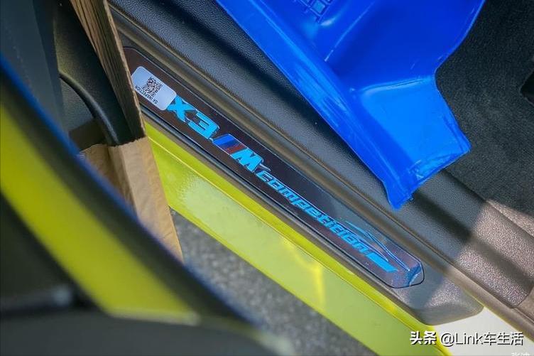 Vibrant and dynamic, the new BMW X3M lemon yellow real car, equipped ...