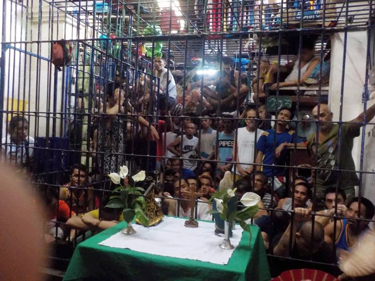 A prison where male and female prisoners are held together, and ...