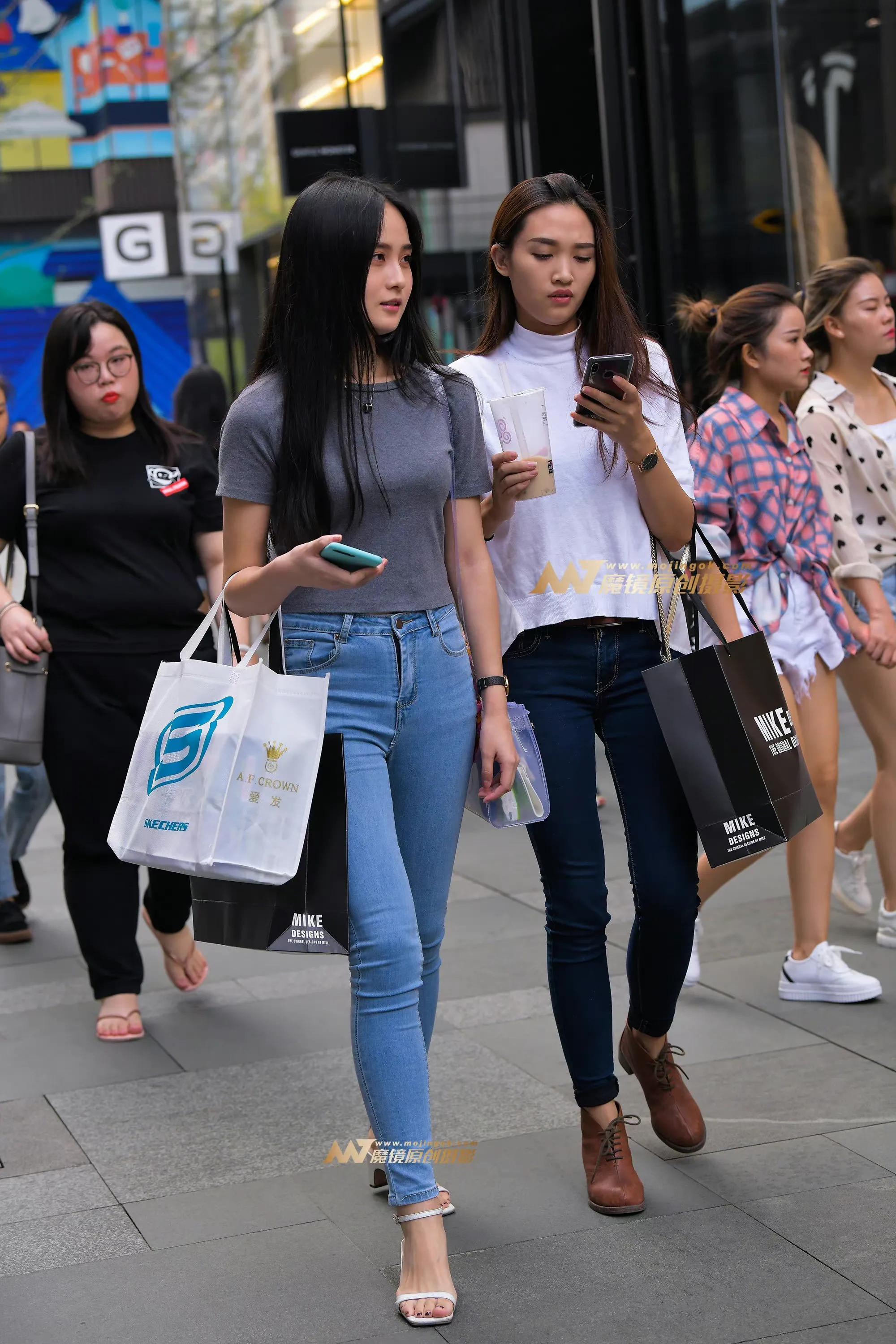 Street shot: The long-legged lady in jeans has a great body, gentle and ...