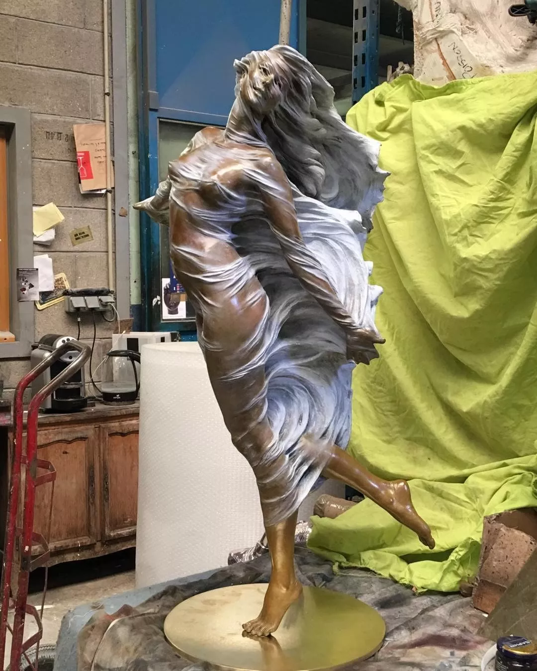 Luo Lirong sculpture - iNEWS