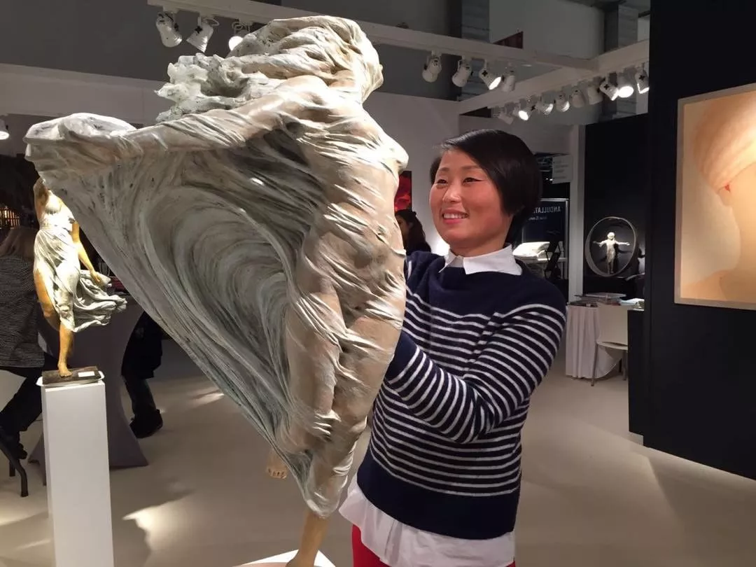 Luo Lirong sculpture - iNEWS