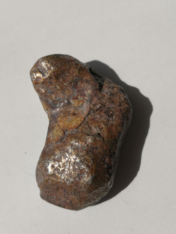 The essential difference between iron meteorite and iron ore and stony ...