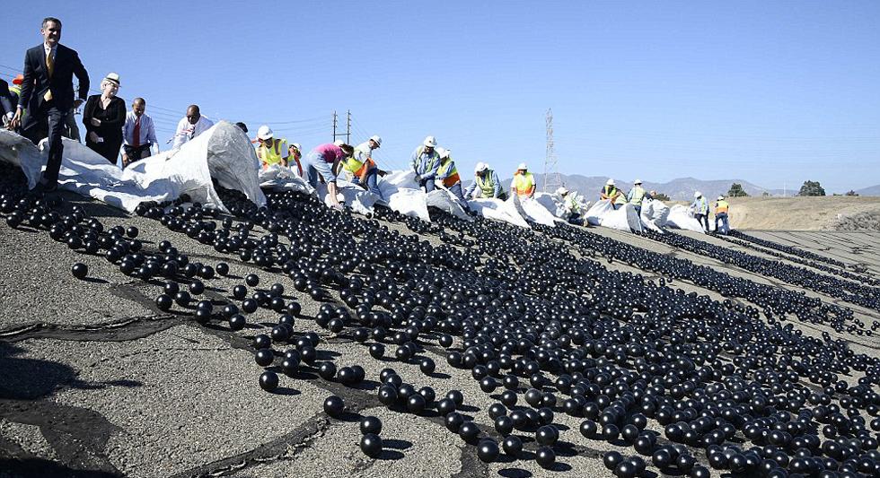 The Americans dropped 96 million black balls into the reservoir. What ...