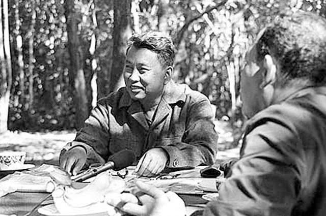 Pol Pot took a group photo with his daughter, and a few children as a ...