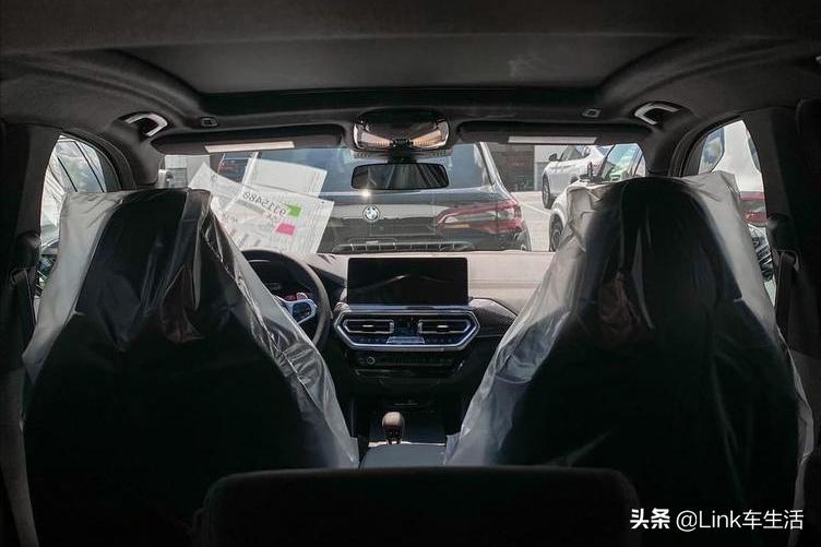 Vibrant and dynamic, the new BMW X3M lemon yellow real car, equipped ...