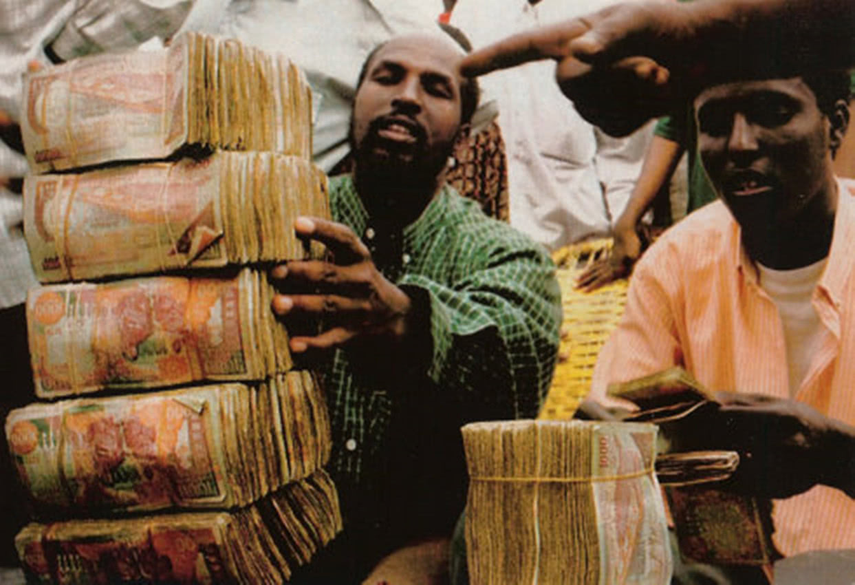 How did Zimbabwe devalue its currency by 1 billion times in 5 months ...