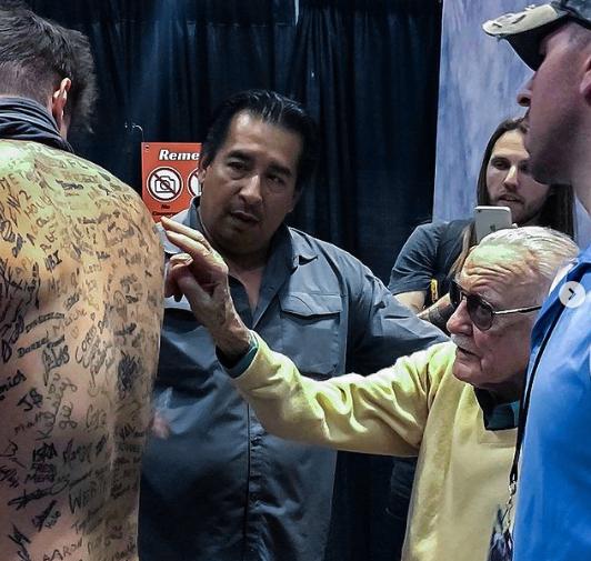 World record holder with the most tattoos on the back of a foreign man ...