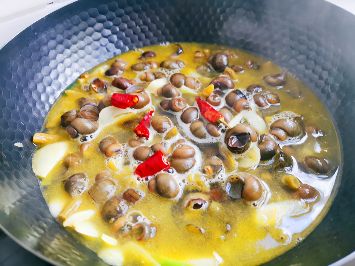 The must-order fried escargot with capers, spicy and refreshing, paired ...