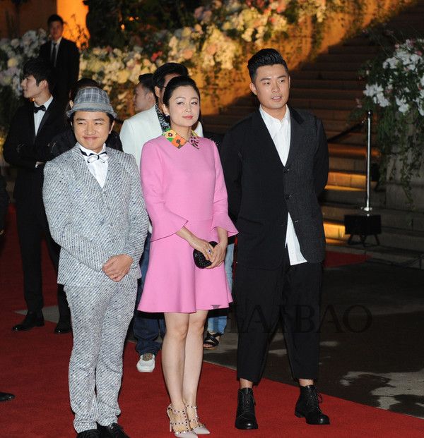 Chen Hong was photographed in the background. The 52-year-old looks out ...