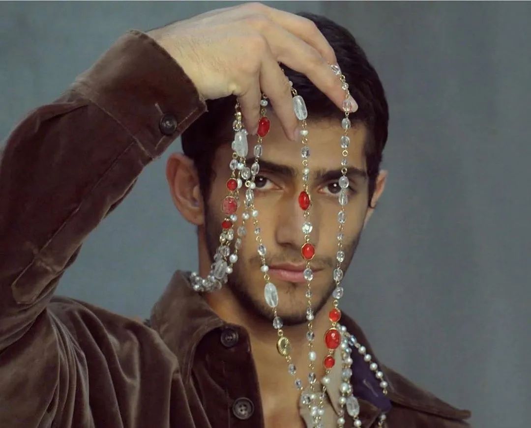 The beautiful life of a Syrian refugee male model, embracing a peaceful ...