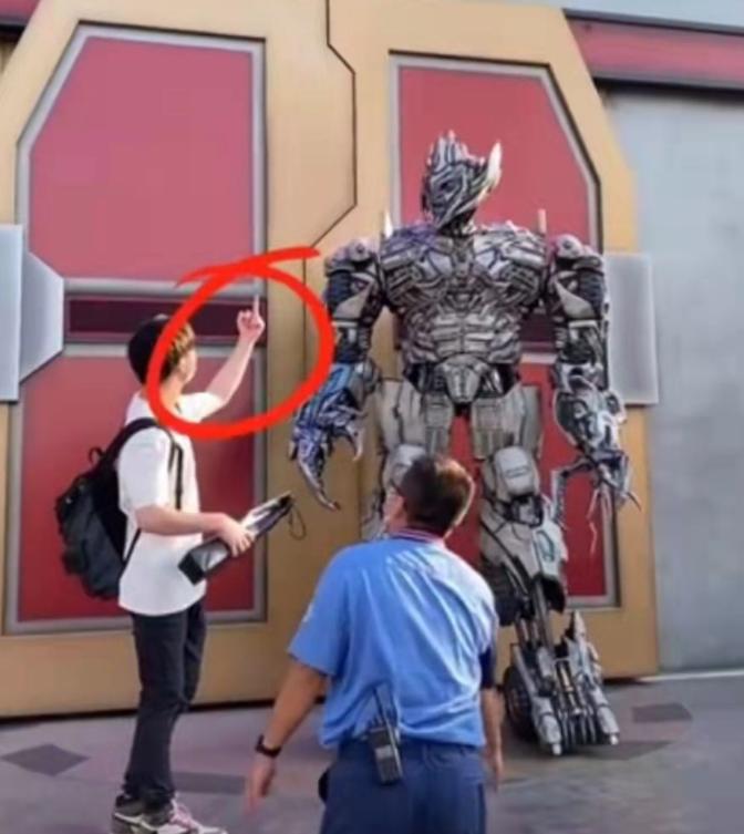 If you compare the middle finger to "Megatron", who loses face in ...