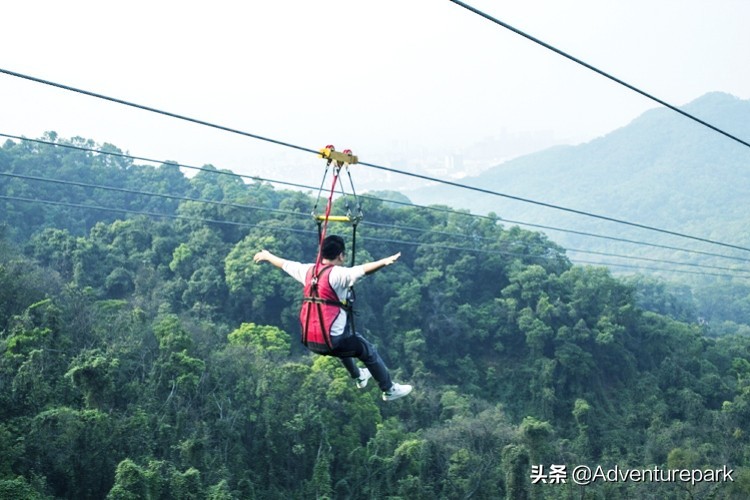 Zipline at high altitude, across mountains and lakes, sliding ...