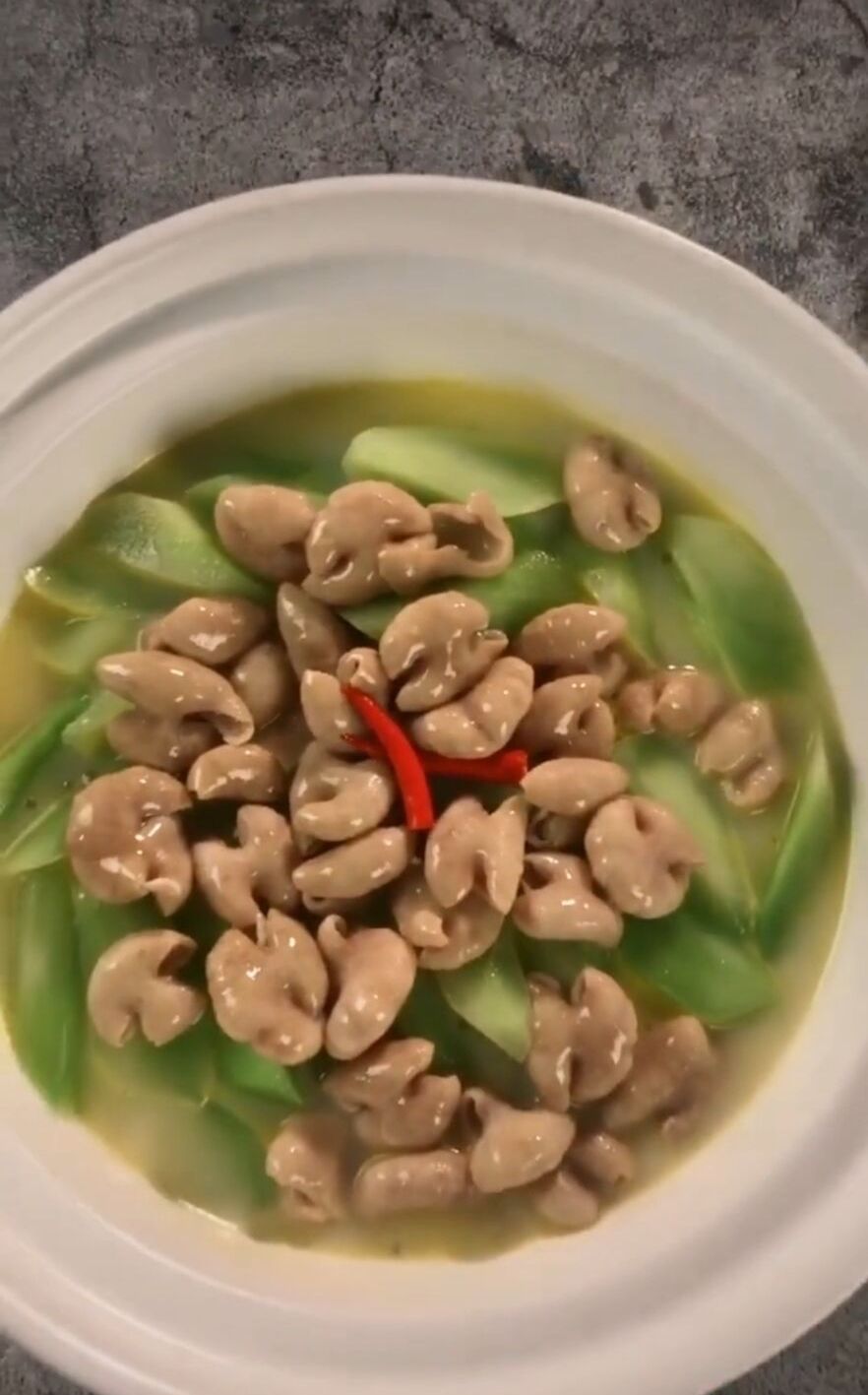 White simmered large intestines and white sauce puffer fish are the ...