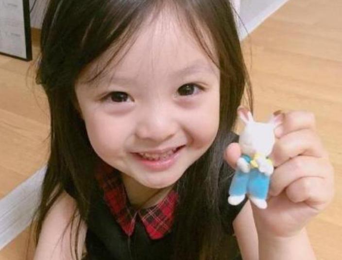 The position of the baby's dimples is different, showing a different ...