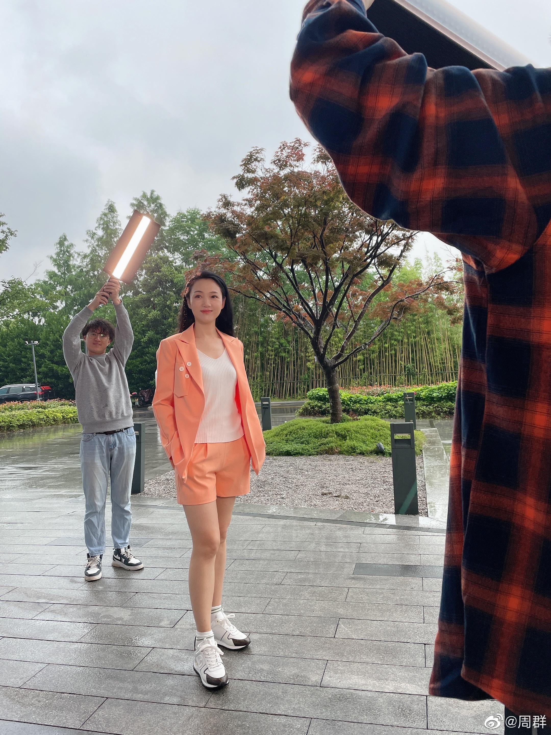 Zhou Qun has a recent photo. She has fair skin and looks very young ...