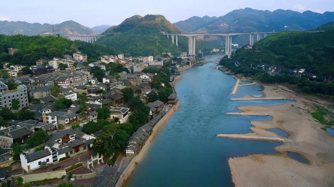 Apart from Maotai Town, what are the three other well-known wine towns ...