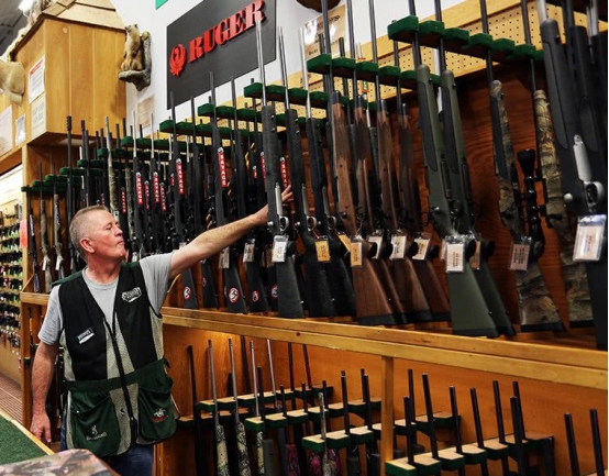 The Taliban set up a street stall to sell weapons. An American pistol ...