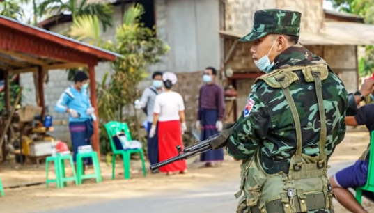 The military and border guards line up the streets with guns at ...