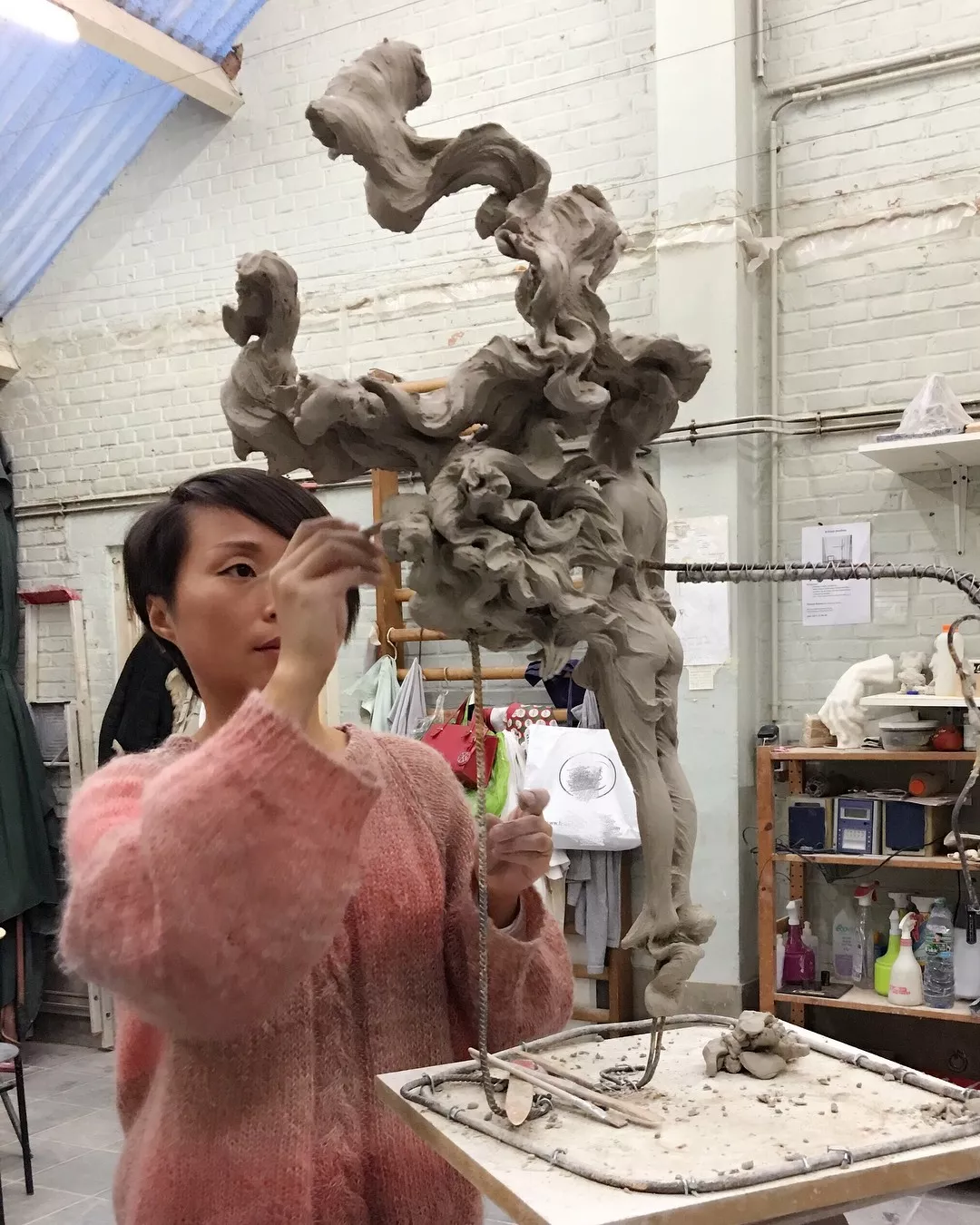 Luo Lirong sculpture - iNEWS