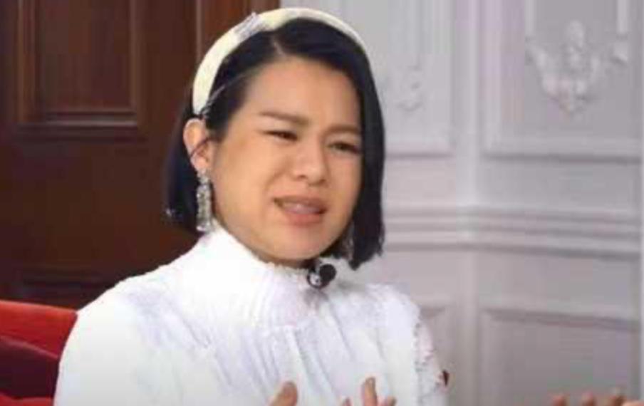 The 41-year-old Hu Xing'er recovers quickly after childbirth. She wears ...